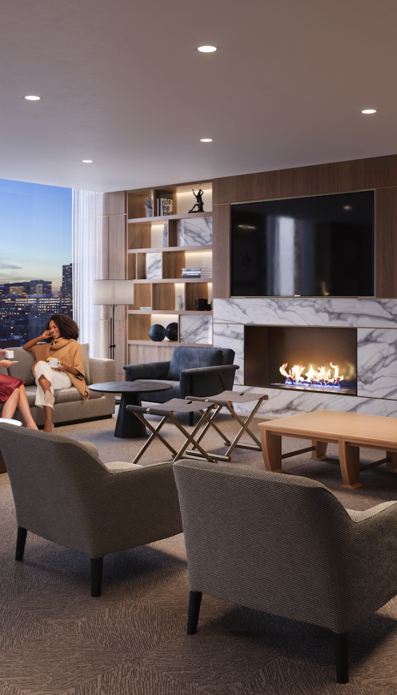 people sit in the library lounge at the quinn